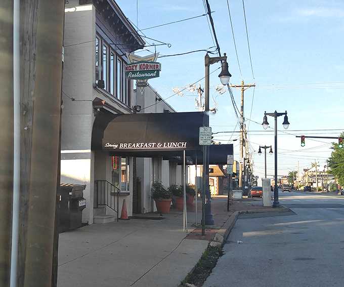 The unassuming storefront of Kozy Korner stands like a time capsule on a Wilmington corner, promising breakfast treasures for those wise enough to step inside.