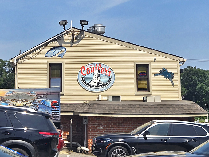 That yellow siding and cheerful crab logo practically shout "seafood paradise ahead" to every passing car.