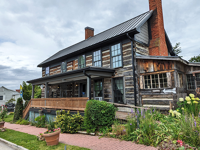 This isn't just a restaurant&mdash;it's a time capsule with a menu. The Log House's weathered exterior promises authentic Virginia hospitality inside those historic walls.