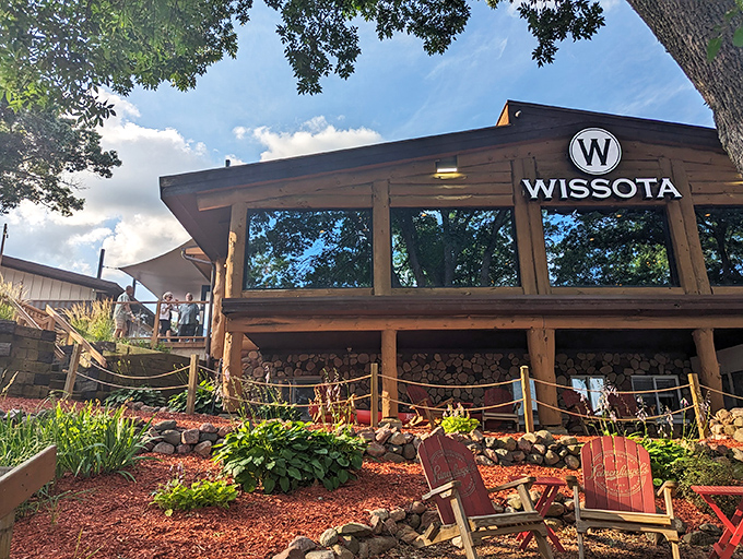 The rustic wooden exterior of Wissota High Shores welcomes you like an old friend, promising lakeside views and culinary delights that'll make your taste buds dance.