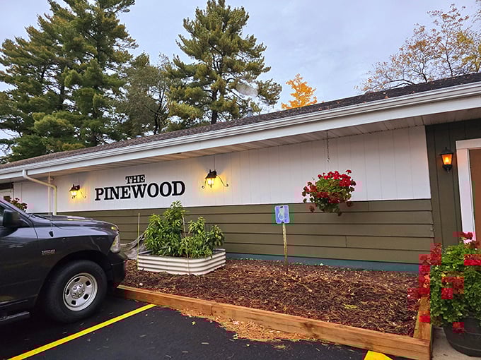 The Pinewood's welcoming exterior promises the kind of supper club magic that makes Wisconsin dining legendary.
