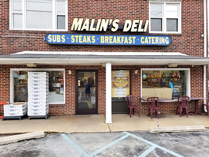 The brick facade of Malin's Deli stands as a beacon of sandwich excellence in Newark, promising subs, steaks, breakfast, and catering to hungry Delaware residents. 