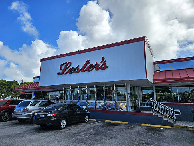 Lester's iconic white and red exterior stands like a beacon of breakfast hope on State Road 84, promising comfort food salvation to hungry Floridians.