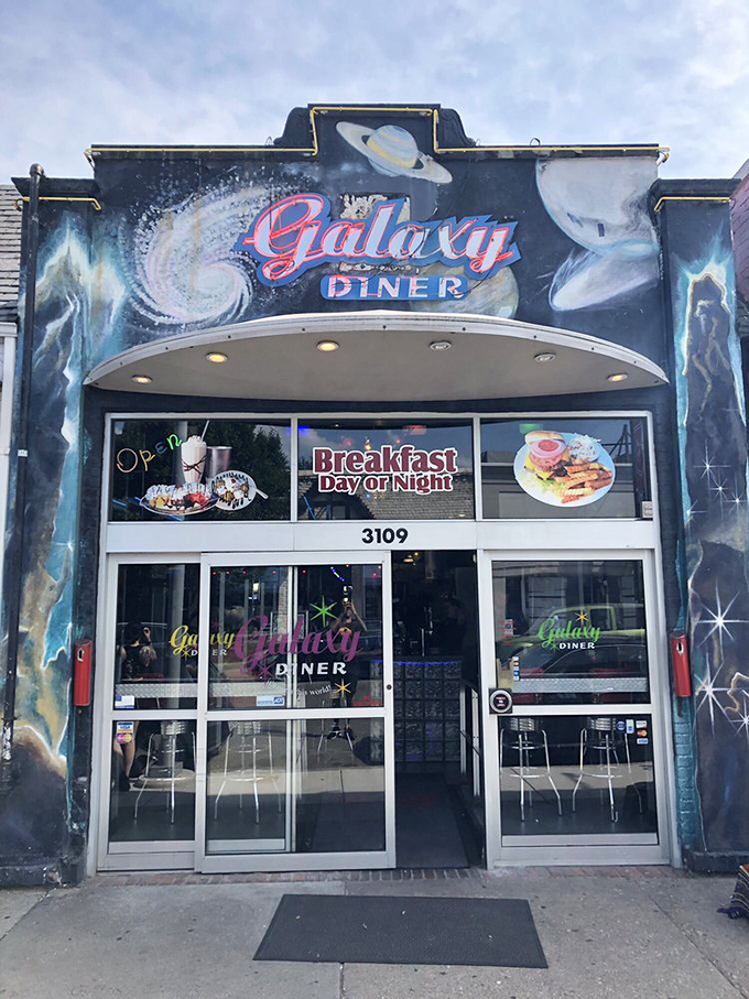 The cosmic facade of Galaxy Diner stands out in Richmond's Carytown district like a neon beacon for hungry earthlings seeking interstellar comfort food.