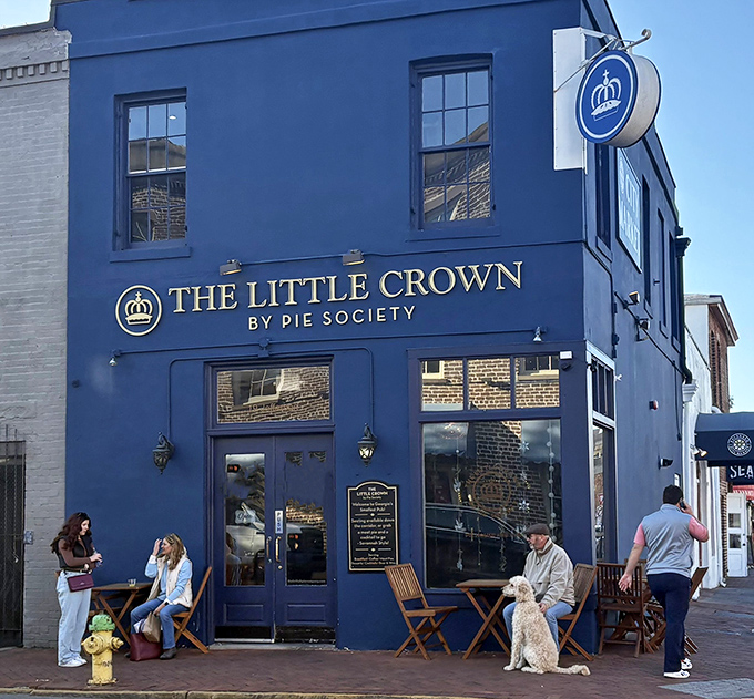 The royal blue facade of The Little Crown stands proudly in Savannah's historic district, beckoning pastry pilgrims with its golden lettering and promise of British delights.