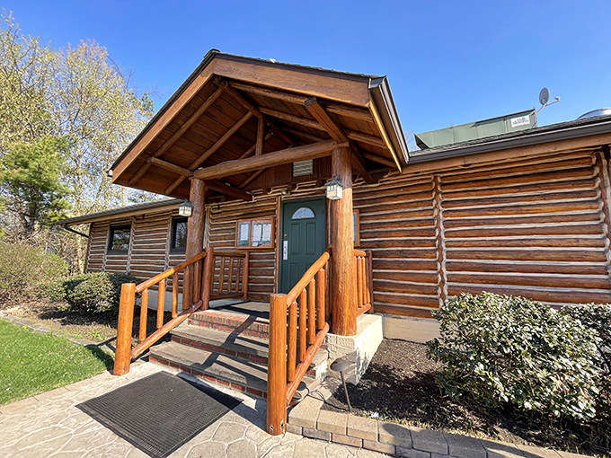 The log cabin exterior isn't playing pretend—it's the real deal, standing proudly on Detroit Road like a woodland ambassador in suburban Westlake.