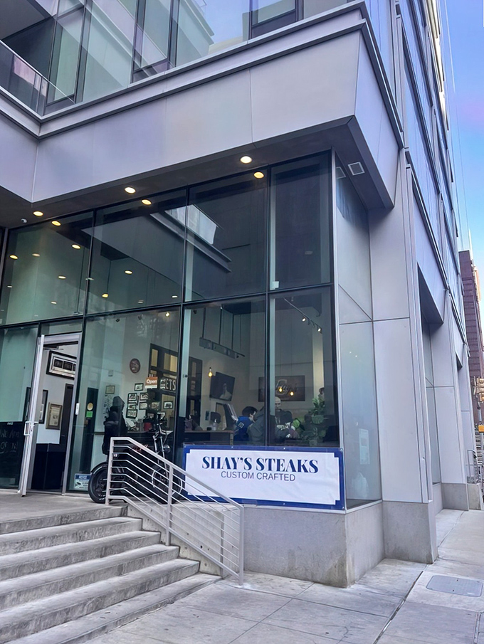 Behind this sleek glass facade lies Philadelphia's best-kept secret for premium steak sandwiches that redefine expectations.