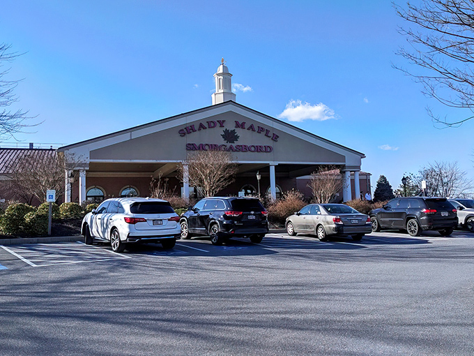 The grand entrance to Shady Maple Smorgasbord stands like a temple to abundance, promising culinary salvation to all who enter its hallowed doors. 