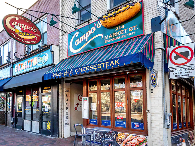 The siren call of sandwich paradise&mdash;Campo's iconic storefront on Market Street, complete with that glorious 3D cheesesteak sign that should qualify as public art.