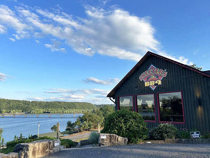 Perched along the Susquehanna River like a green sentinel of smoke and flavor, Skeeter's BBQ offers a view that rivals the food&mdash;almost.