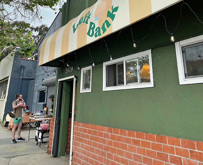 The unassuming green exterior with its jaunty striped awning conceals a treasure trove of fashion finds. It's like the speakeasy of thrift stores.