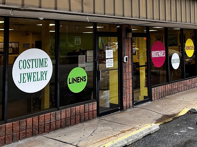 The storefront speaks volumes with its colorful circular signs&mdash;each one a portal to possibility and proof that treasure hunting begins before you even step inside.