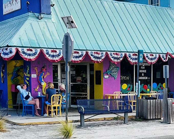 This colorful island paradise practically shouts "come on in!" with its vibrant purple walls and patriotic charm.