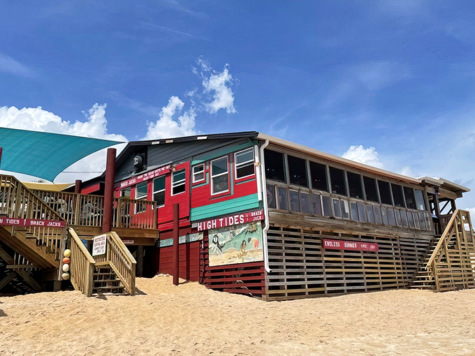 This isn't just a restaurant on the beach&mdash;it's practically IN the beach. Red and teal weathered wood that's seen a thousand sunsets and keeps on smiling.