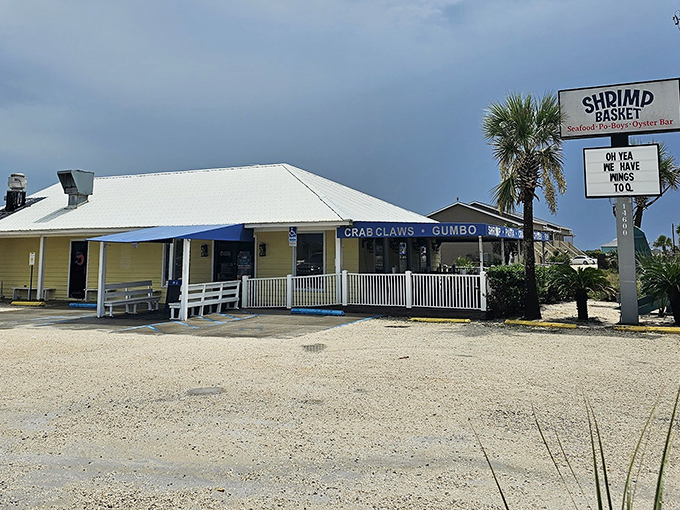 The yellow beach house with "CRAB CLAWS &bull; GUMBO" banner isn't trying to impress anyone&mdash;until you taste what's inside. Florida seafood authenticity at its unpretentious best.