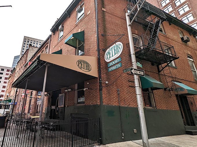 The unassuming brick exterior of Peter's Pour House beckons with its classic green awning and Irish flag&mdash;a culinary treasure hiding in plain sight.
