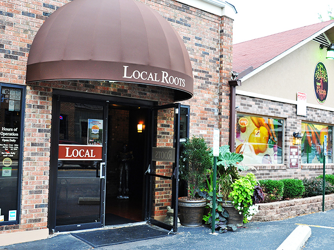 The welcoming brick-and-tan exterior of Local Roots stands ready to lure you in like a culinary siren song to Powell's best-kept secret.