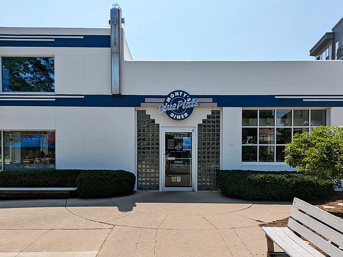 The blue-trimmed facade of Monty's Blue Plate Diner stands like a time capsule on Madison's east side, promising comfort food that transcends decades.