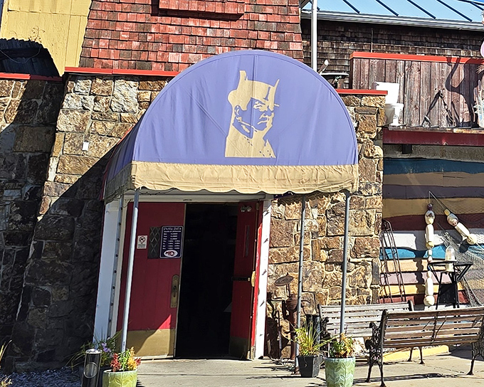 The iconic purple awning of Pickle Bill's stands out like a maritime beacon, promising seafood treasures within those stone walls. 