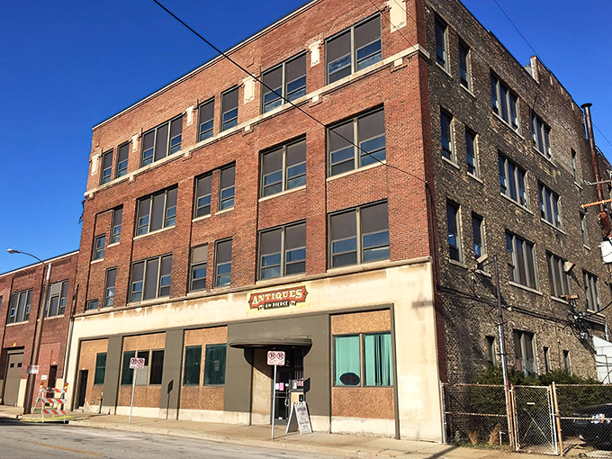 The unassuming brick exterior of Antiques on Pierce hides a wonderland of treasures inside, like a history-filled Narnia behind an industrial wardrobe.