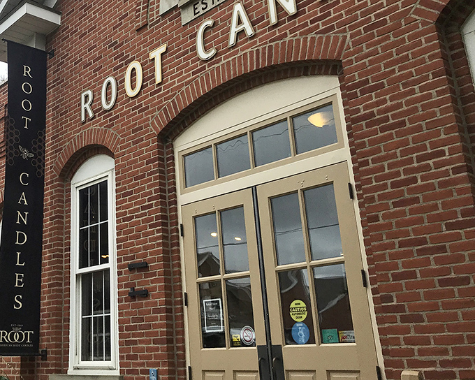 The historic brick fa&ccedil;ade of Root Candles stands proudly in Medina, a beacon of light-making tradition since 1869. Some buildings just look like they have stories to tell.