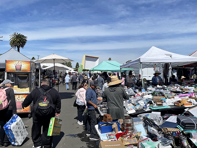 Treasure hunters navigate endless rows of vendors under California's perfect blue sky at the Roadium. 