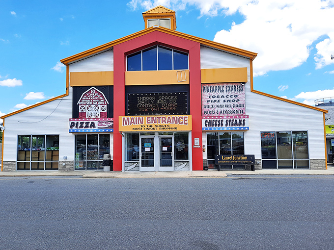 The colorful facade of Laurel Junction beckons treasure hunters with promises of pizza, cheese steaks, and the mysterious "Pineapple Express." Adventure awaits!