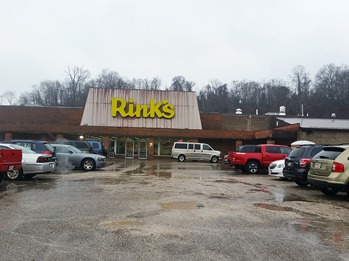 The unassuming exterior of Rinks belies the wonderland within. Like finding a treasure map in your attic, this humble storefront promises adventures your credit card never saw coming.
