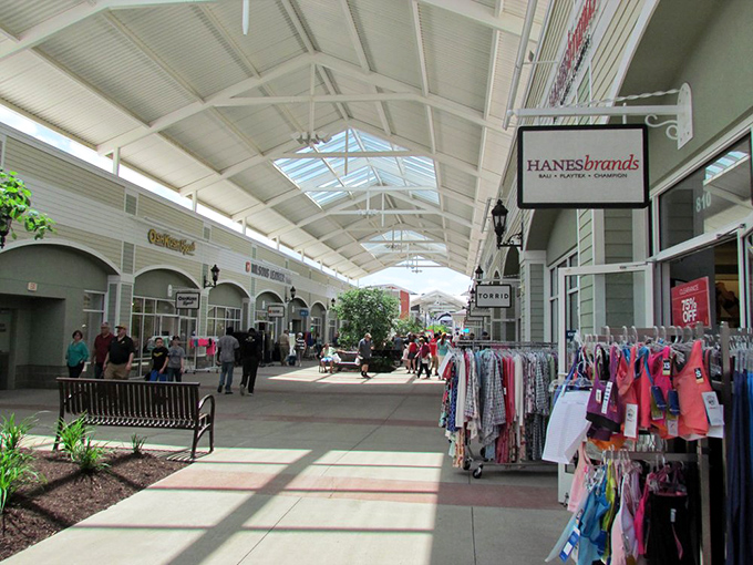 The architectural charm of Tanger Outlets Pittsburgh creates a village-like shopping experience, complete with iconic horse sculptures that serve as both art and meeting point.