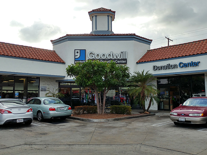 The Spanish-style architecture with its signature terracotta roof makes this Goodwill look more like a boutique resort than a thrift store paradise.