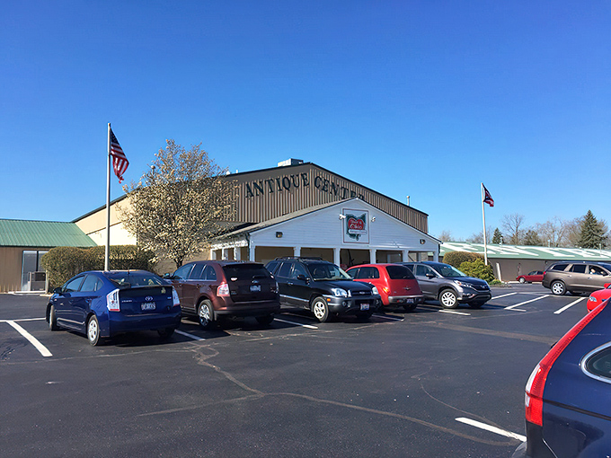 The unassuming exterior of Heart of Ohio Antique Center stands like a treasure chest waiting to be opened, American flags proudly announcing its patriotic collection within.