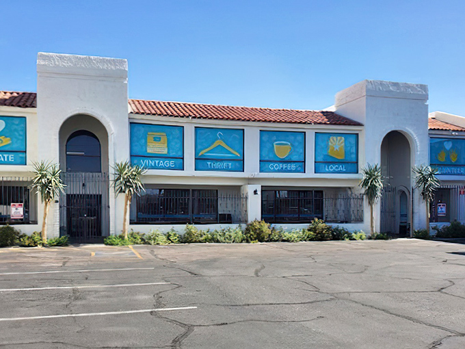 The pristine white exterior of Thrift to Thrive beckons like a siren song to bargain hunters. Those blue window panels aren't just decorative&mdash;they're portals to treasure hunting paradise.