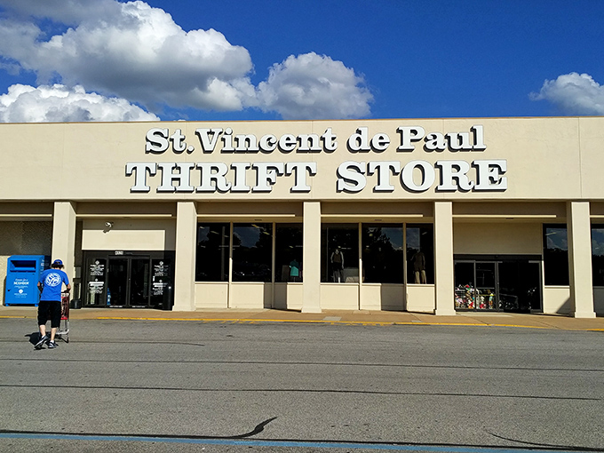 The storefront beckons like a siren song to bargain hunters. Under that blue Missouri sky, treasures await behind those unassuming doors.