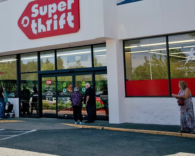 The iconic red SuperThrift sign welcomes bargain hunters like a beacon of hope for both wallets and vintage-lovers alike.