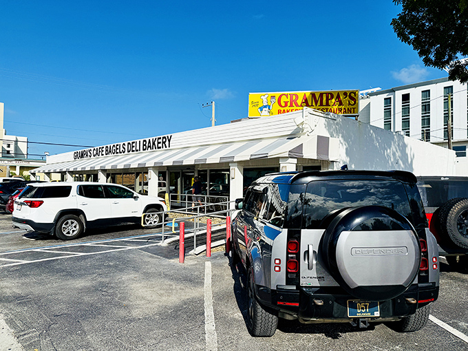The iconic black and white awning of Grampa's stands like a beacon of breakfast hope on South Federal Highway, promising carb-laden bliss within.