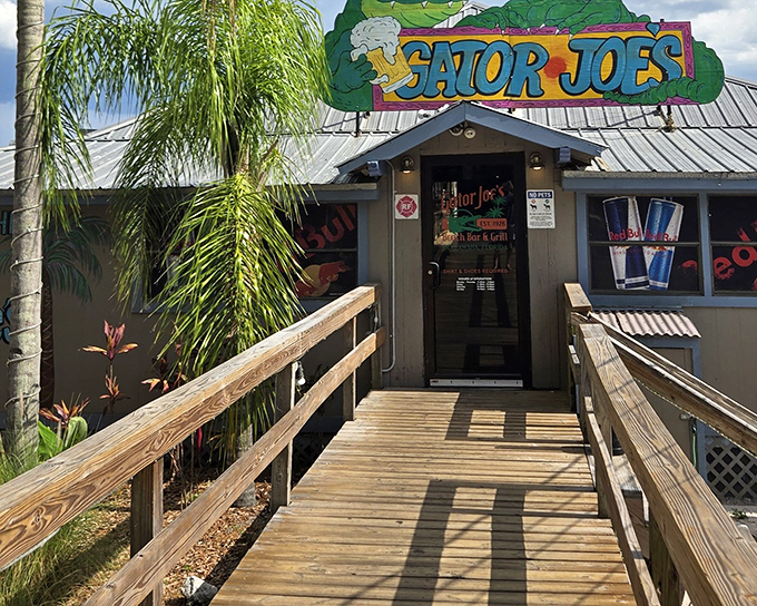 The wooden walkway to flavor paradise. Gator Joe's unassuming entrance promises authentic Florida dining without pretension, just pure lakeside charm.