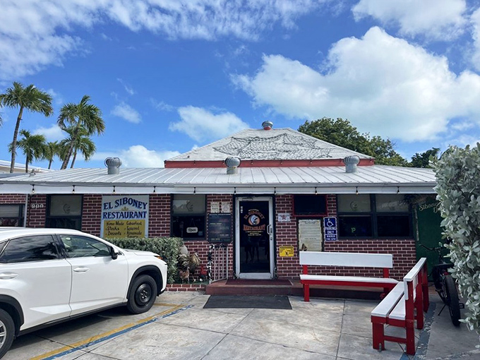 The unassuming brick exterior of El Siboney is like a culinary speakeasy&mdash;no flash, just the promise of authentic Cuban treasures waiting inside.