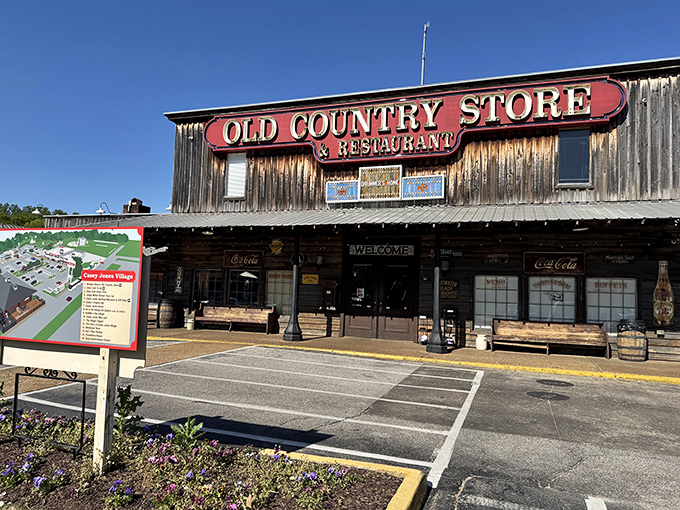 The weathered wooden exterior of Brooks Shaw's Old Country Store beckons like a time machine disguised as a restaurant. Southern comfort awaits inside! 