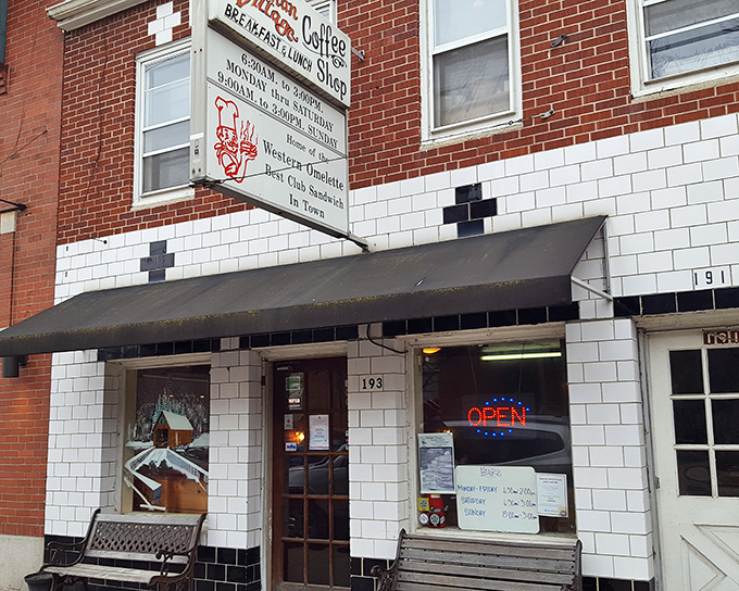 The unassuming white-tiled exterior of German Village Coffee Shop hides culinary treasures within. Like finding a Picasso at a yard sale.