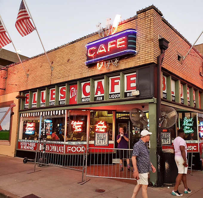 The iconic brick facade of Blues City Cafe stands as a beacon on Beale Street, promising Memphis magic in every bite.