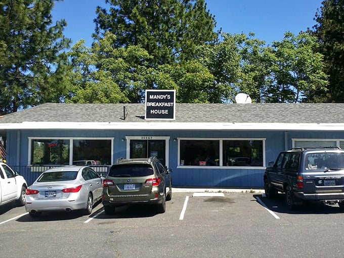 The blue exterior of Mandy's Breakfast House stands like a humble treasure chest, promising golden breakfast delights within. No fancy frills needed when the food does the talking.
