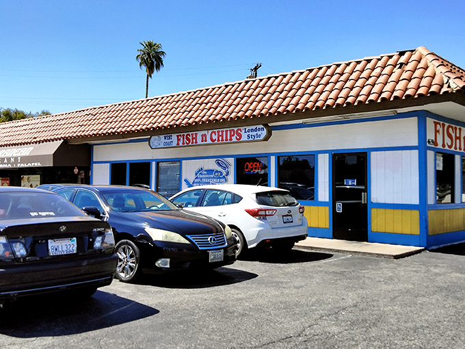 The blue and yellow facade of West Coast Fish N' Chips stands like a beacon of fried goodness in Fresno, promising seafood salvation in the Central Valley.