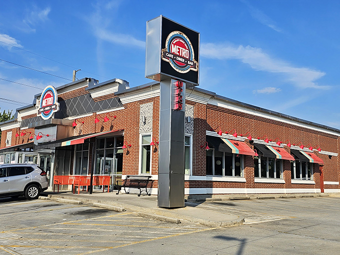 The brick exterior with its distinctive red awnings promises comfort food salvation, like a lighthouse for the hungry traveler.