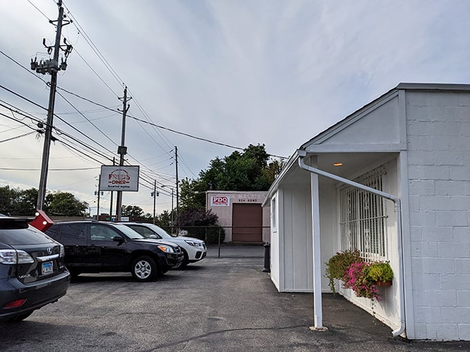 The unassuming white exterior of Fred's Diner proves once again that culinary treasures often hide in plain sight. No frills, just thrills await inside.