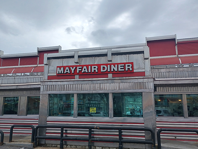 That gleaming stainless steel exterior isn't just a building—it's a time machine disguised as a diner on Frankford Avenue.