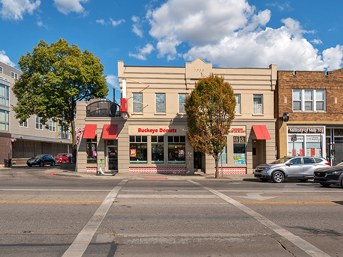 The unassuming storefront with its cheerful red awnings has been a Columbus landmark for decades, beckoning hungry visitors with promises of sweet and savory delights.