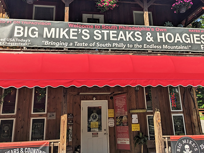 The red awning of Big Mike's beckons like a culinary lighthouse in the Pennsylvania wilderness, promising authentic South Philly flavors in the most unexpected location.