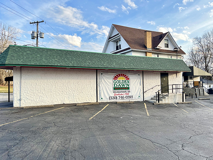 The unassuming exterior of Golden Dawn hides culinary treasures within—proof that you should never judge a restaurant by its façade.