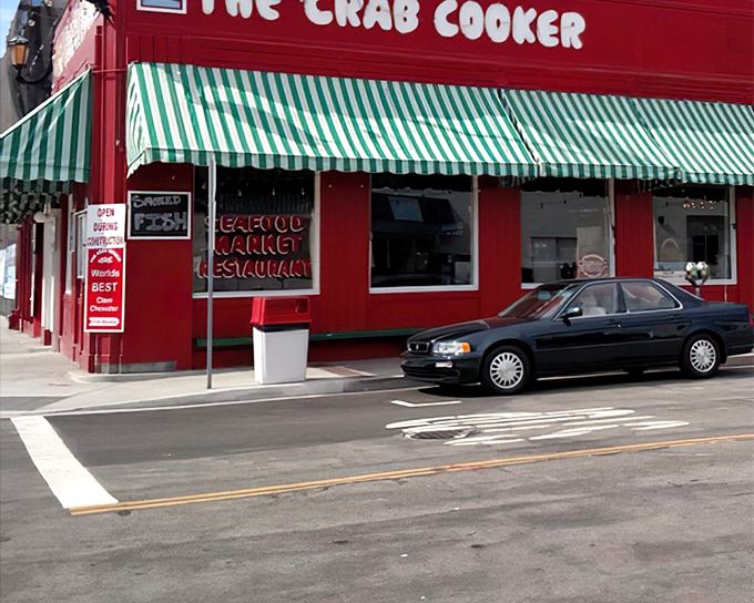 The fire-engine red exterior of The Crab Cooker stands out like a culinary lighthouse, beckoning seafood lovers to Newport Beach's most unpretentious treasure.