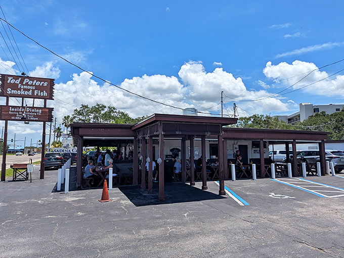 The unassuming exterior of Ted Peters Famous Smoked Fish stands like a time capsule on Pasadena Avenue, where that intoxicating smoky aroma first grabs you.
